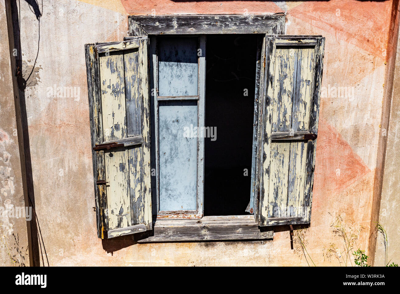 Exterior Window and Bleached Wooden Shutter Detail of a Derelict WW2 ...