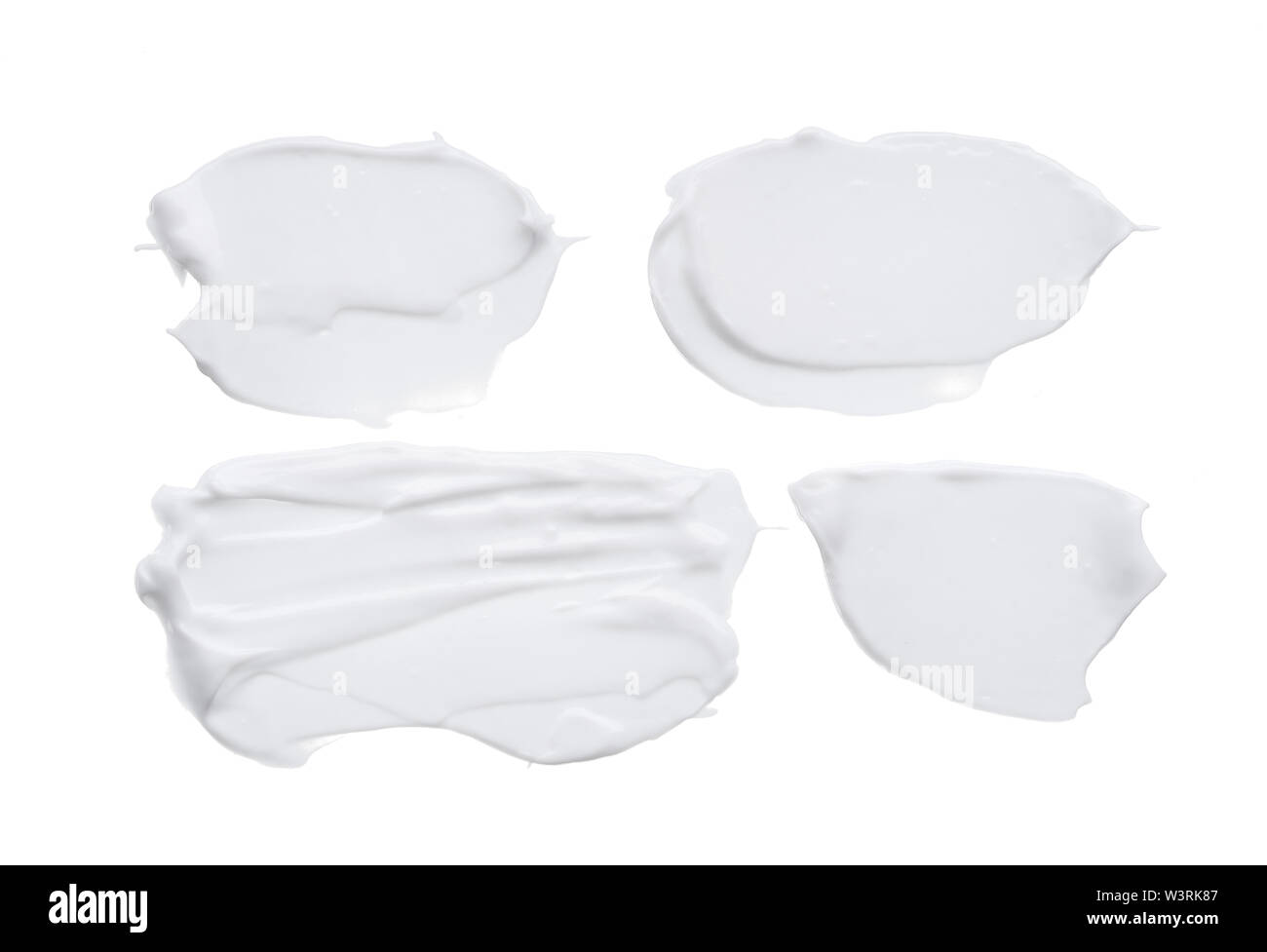 White smear and texture made with face clay or cream isolated on white ...