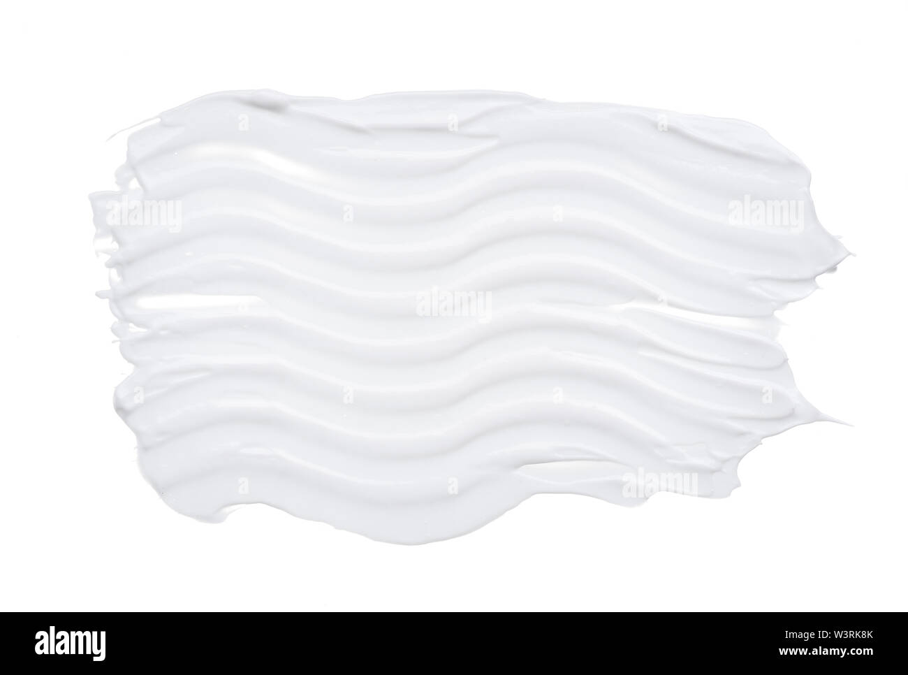 White smear and texture made with face clay or cream isolated on white ...