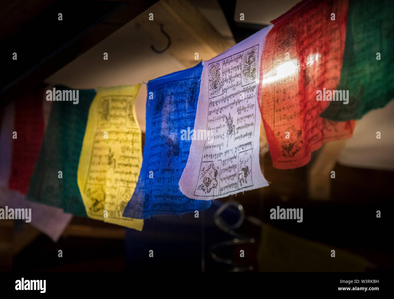 Colourful prayer flags hanging in a row Stock Photo - Alamy