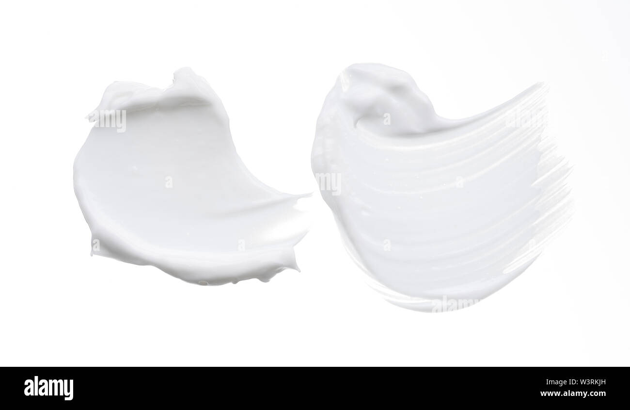 White smear and texture made with face clay or cream isolated on white ...