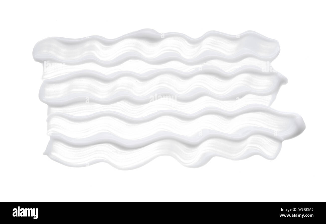 White smear and texture made with face clay or cream isolated on white ...