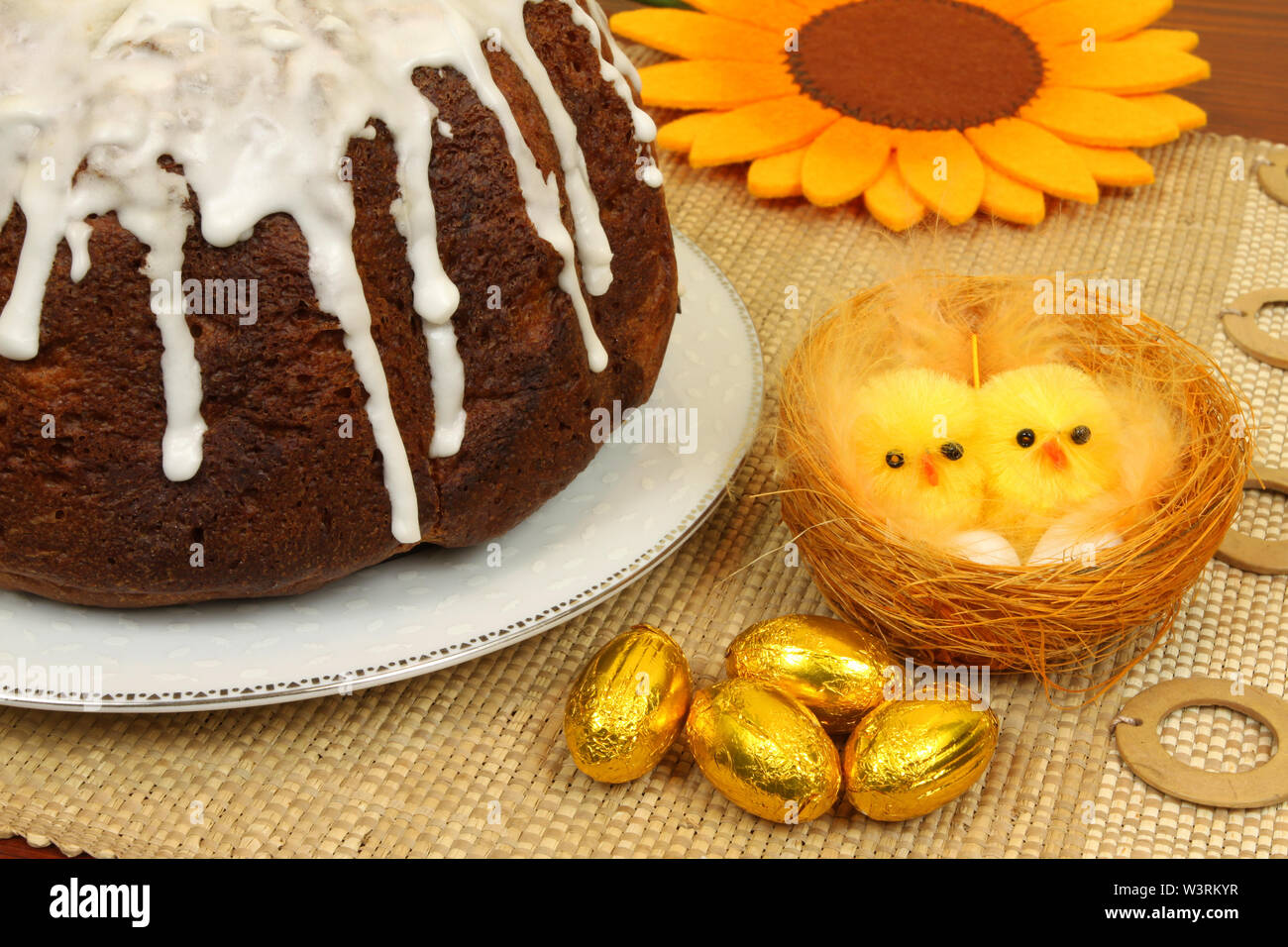 Easter decoration of table - traditional cake with icing, chocolate ...