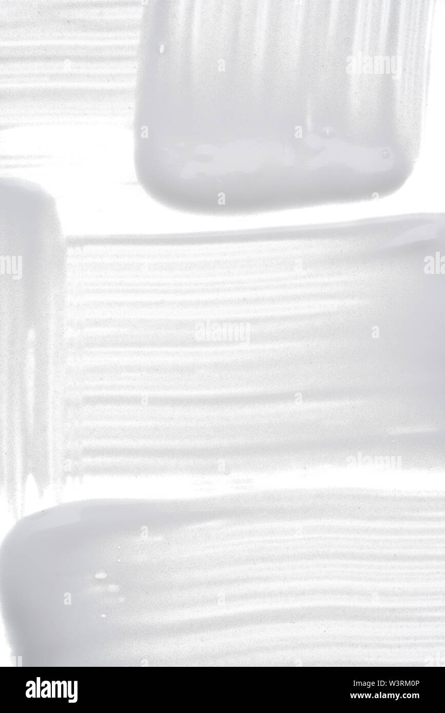 White smear and texture made with face clay or cream isolated on white ...