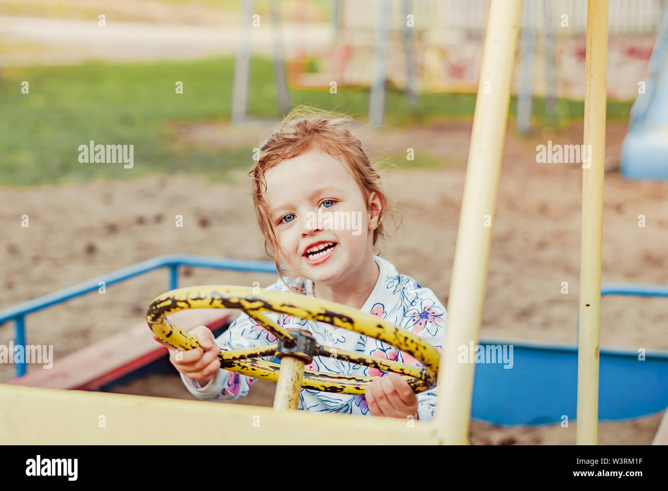 the child plays on the Playground Stock Photo - Alamy