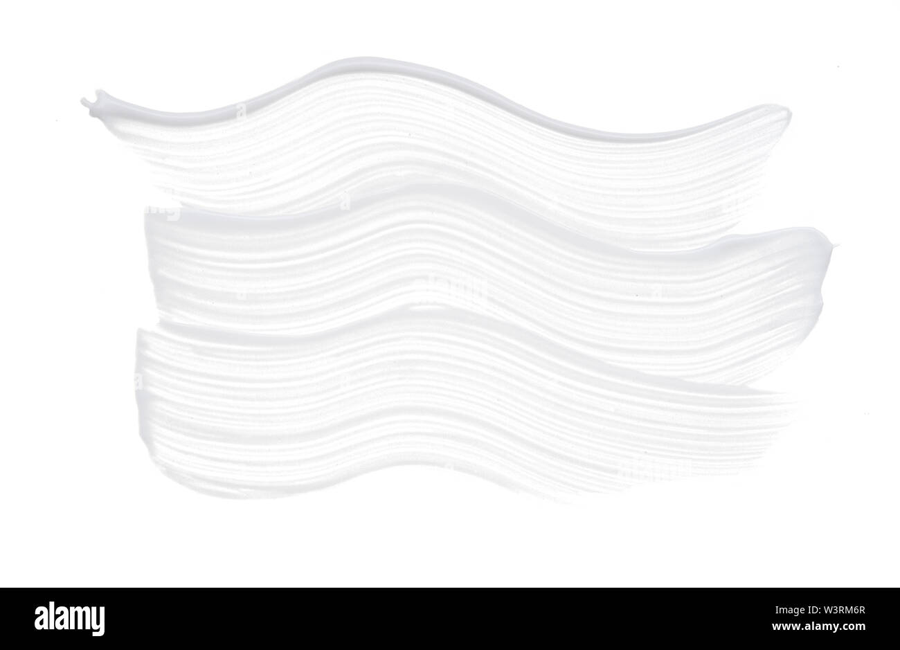 White smear and texture made with face clay or cream isolated on white ...