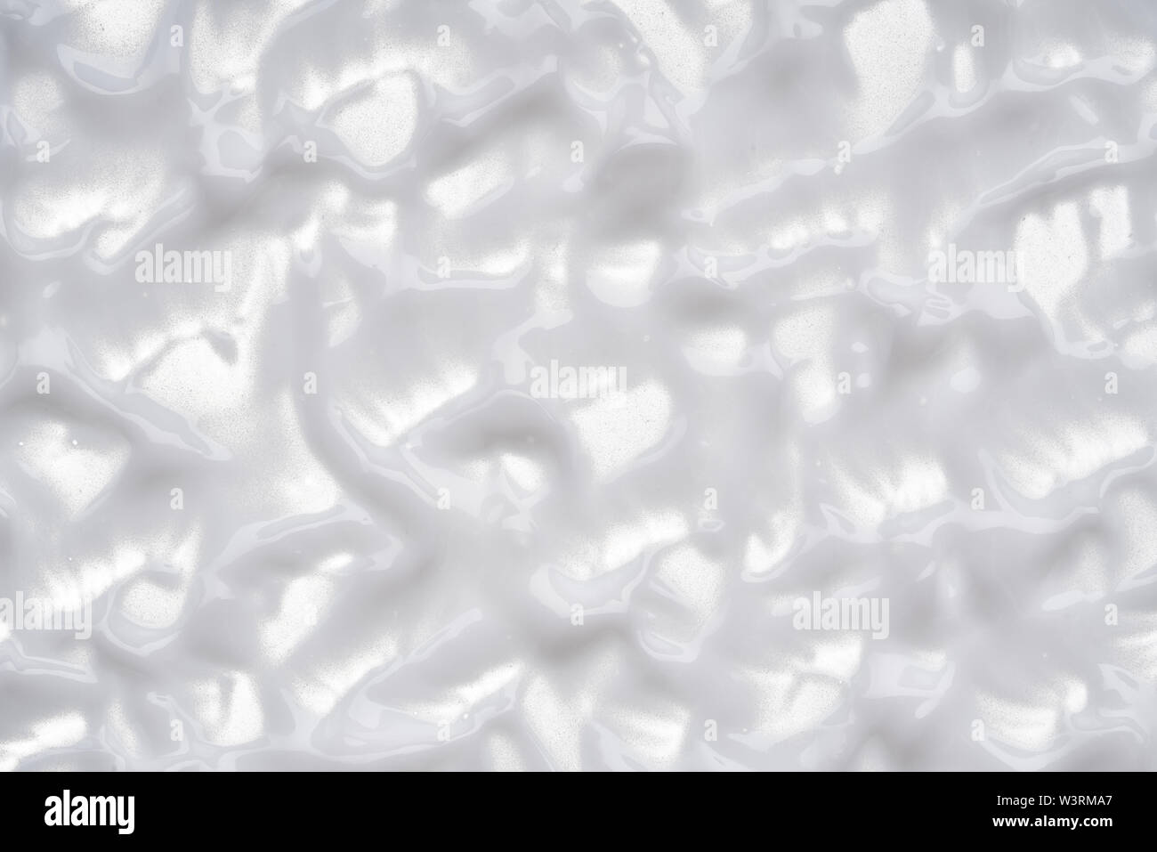 White smear and texture made with face clay or cream isolated on white ...