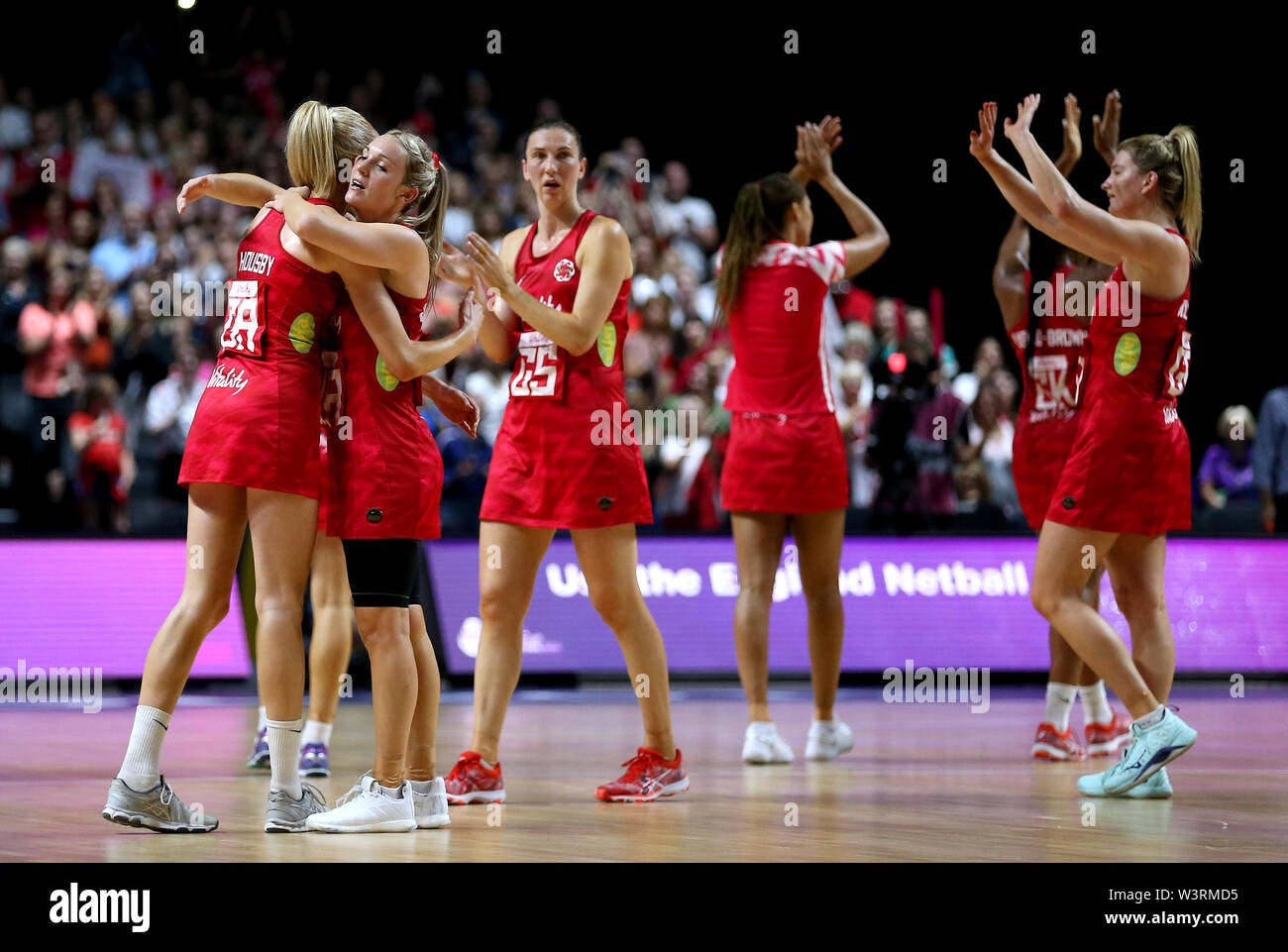 England players celebrate their victory at the end of the Netball World ...