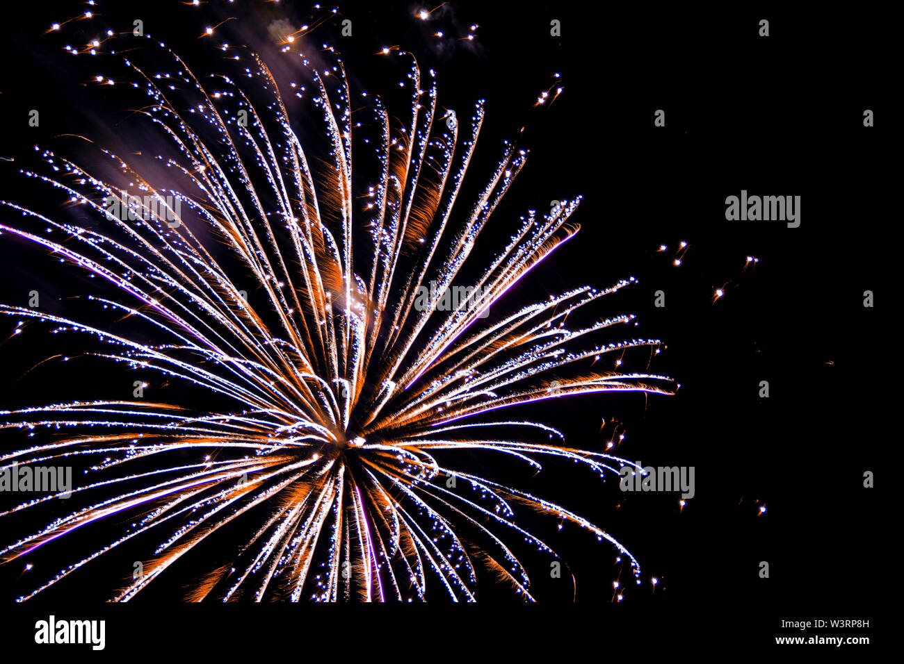 Abstract shot of fireworks being fired into the night sky during 4th of ...
