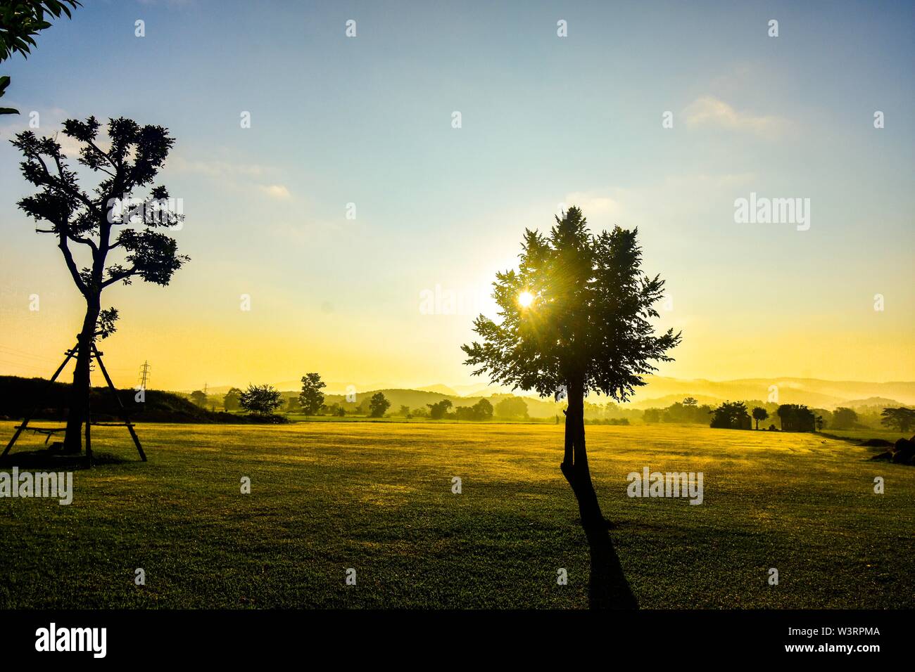 Shadows in the sunrise Stock Photo - Alamy