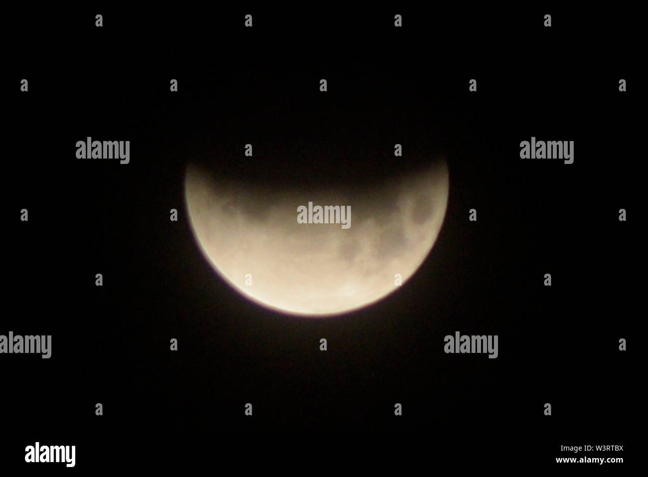 Moon passes between earth and the sun hi-res stock photography and ...