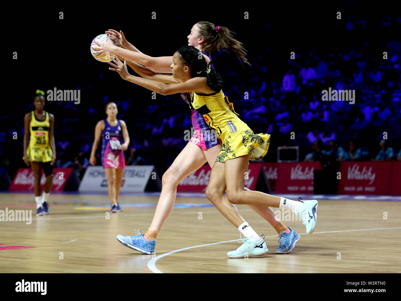 Jamaica's Shamera Sterling (right) and Scotland's Emma Barrie in action ...