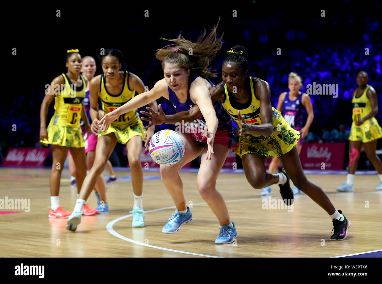 Scotland's Bethan Goodwin (left) and Jamaica's Jodiann Ward in action ...