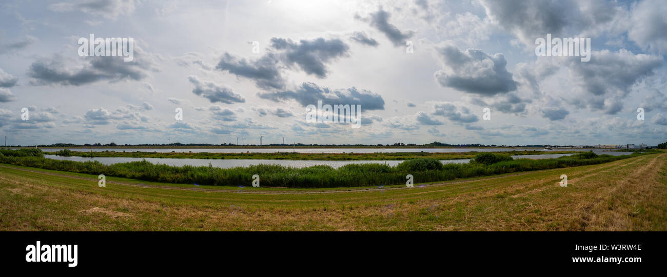 Panoramic view of the beautiful nature with a river Stock Photo - Alamy
