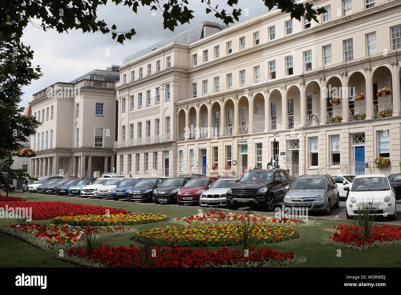 Regency buildings and flower beds. the Promenade, Cheltenham Stock ...