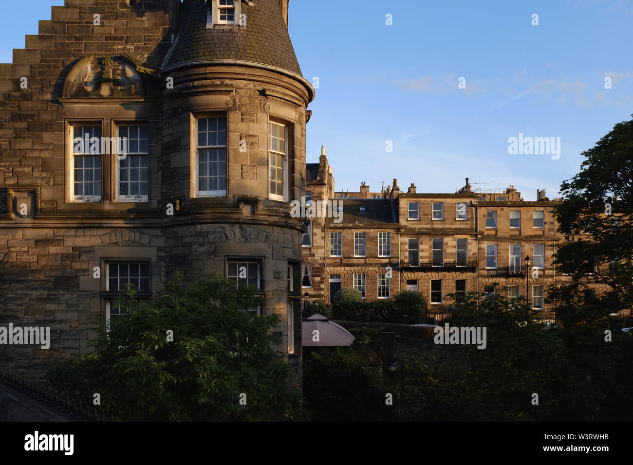 Tenements and trees overlooking Dean Village, viewed from Dean Bridge ...