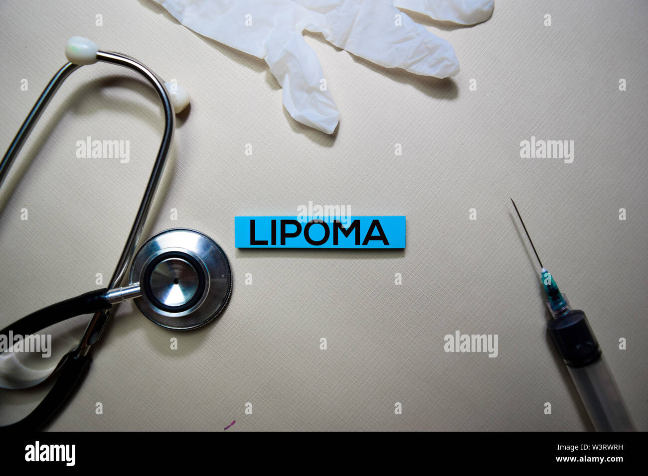 Lipoma text on Sticky Notes. Top view isolated on office desk ...