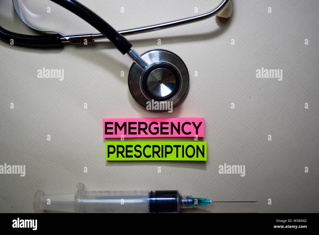 Emergency Prescription text on Sticky Notes. Top view isolated on ...