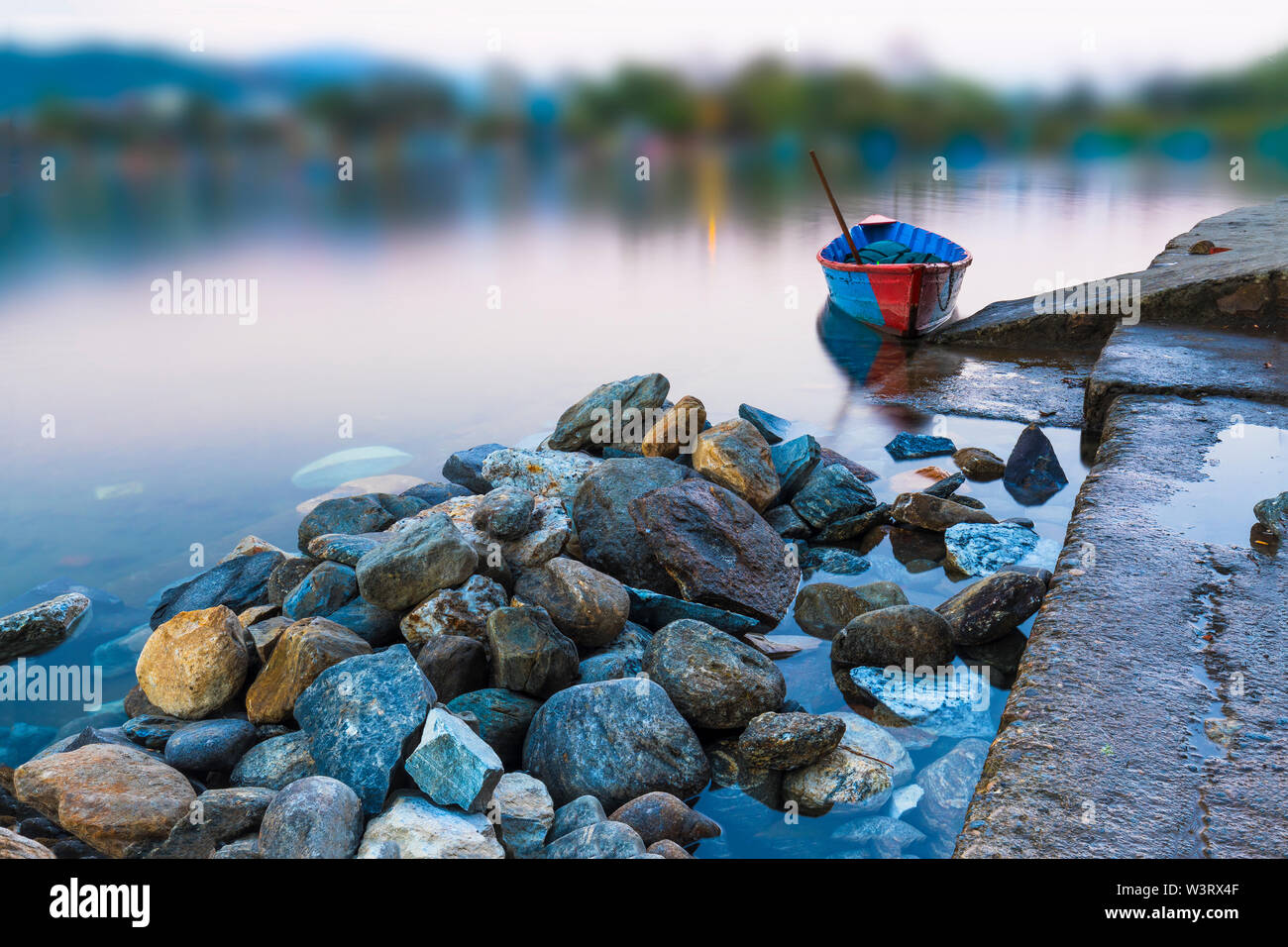 Single boat in Phewa Lake and blurred background.Pokhara Nepal Stock ...