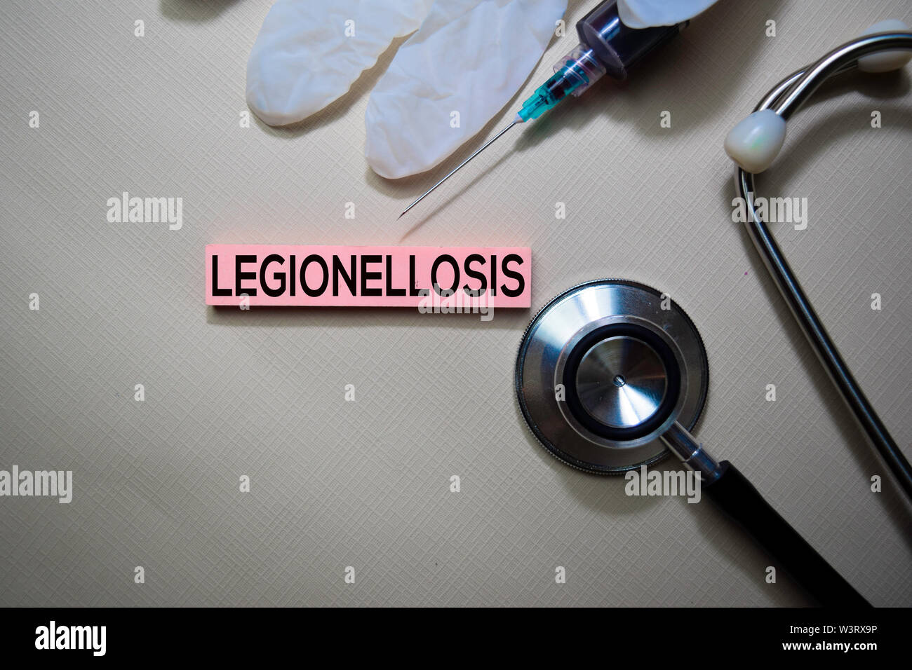 Legionellosis text on Sticky Notes. Top view isolated on office desk ...