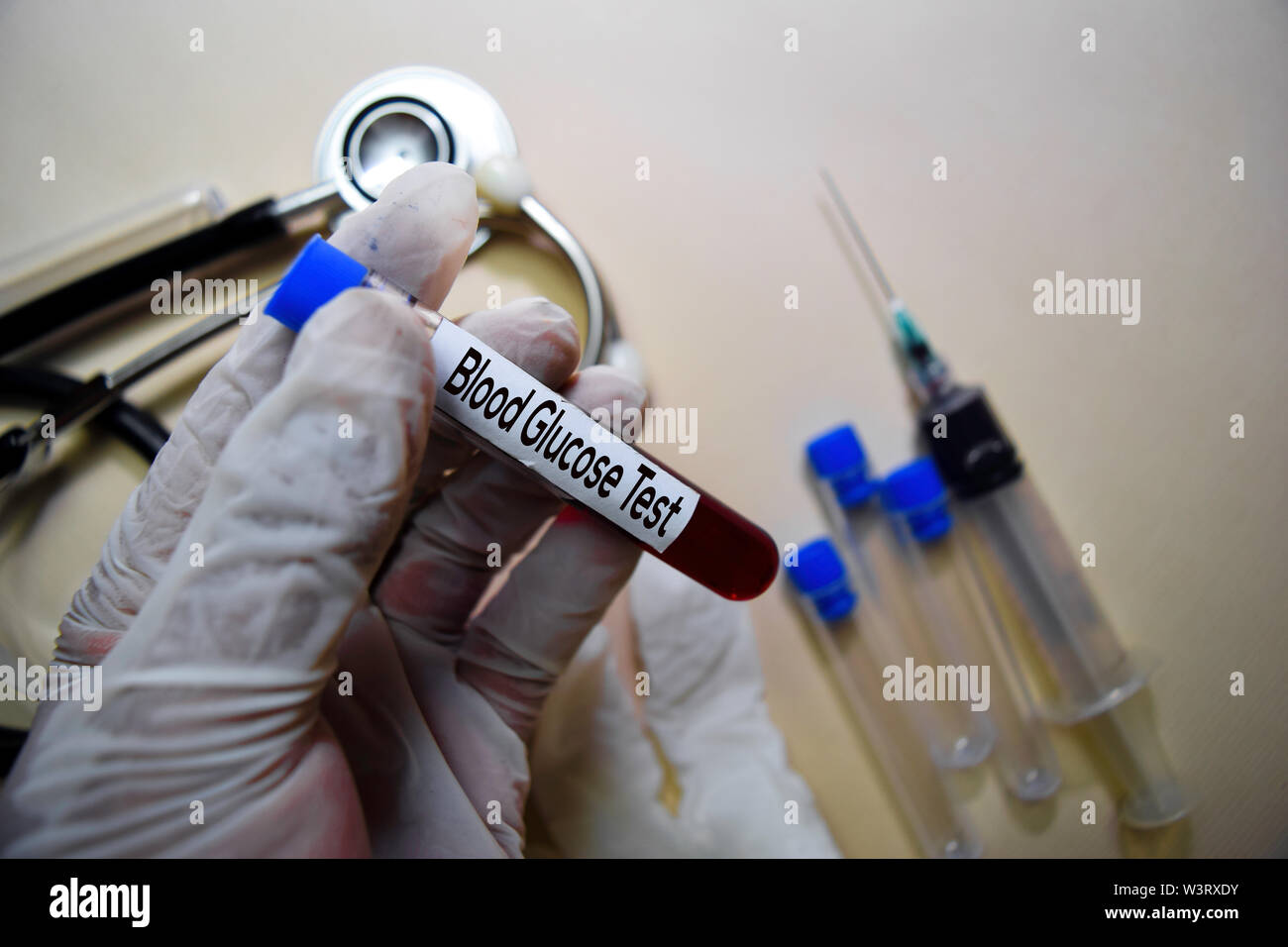 Blood Glucose Test text on Sticky Notes. Top view isolated on office ...