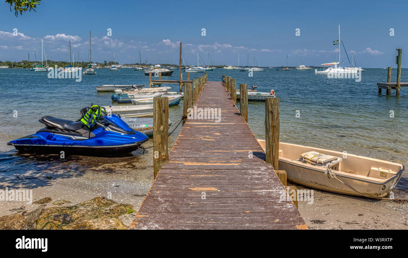Small jet ski and boats docked on Anna Maria Island, Florida Stock ...