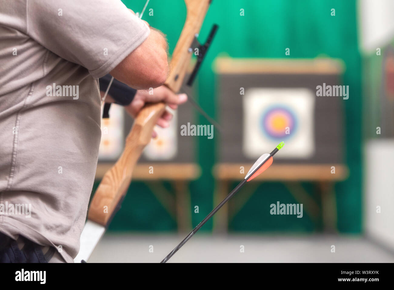 Archer hands close up, preparing the arrow for the shot Stock Photo - Alamy