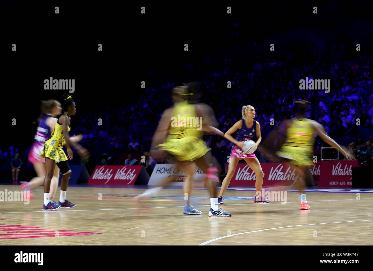 Scotland's Sarah MacPhail (second right) in action during the Netball ...