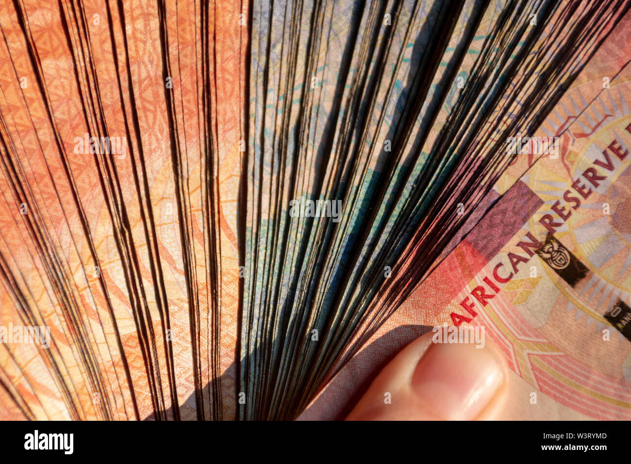 South african bank notes in hand hi-res stock photography and images ...