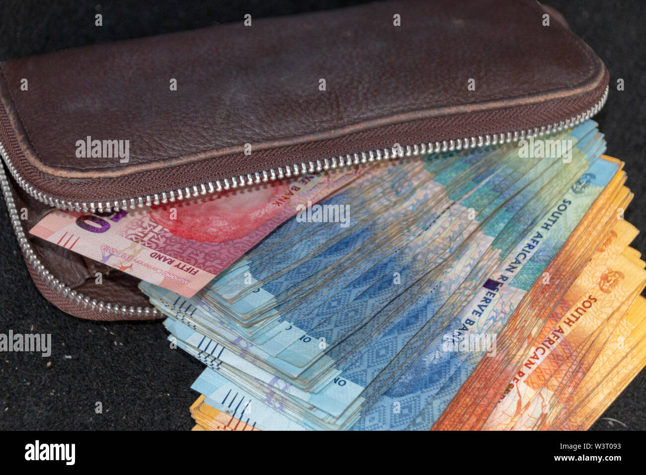 Wallet With Money Coming Out