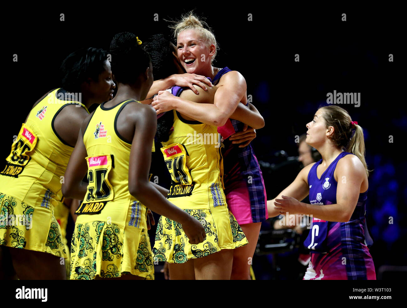 Jamaica's Shamera Sterling picks up Scotland's Nicola McCleery during ...