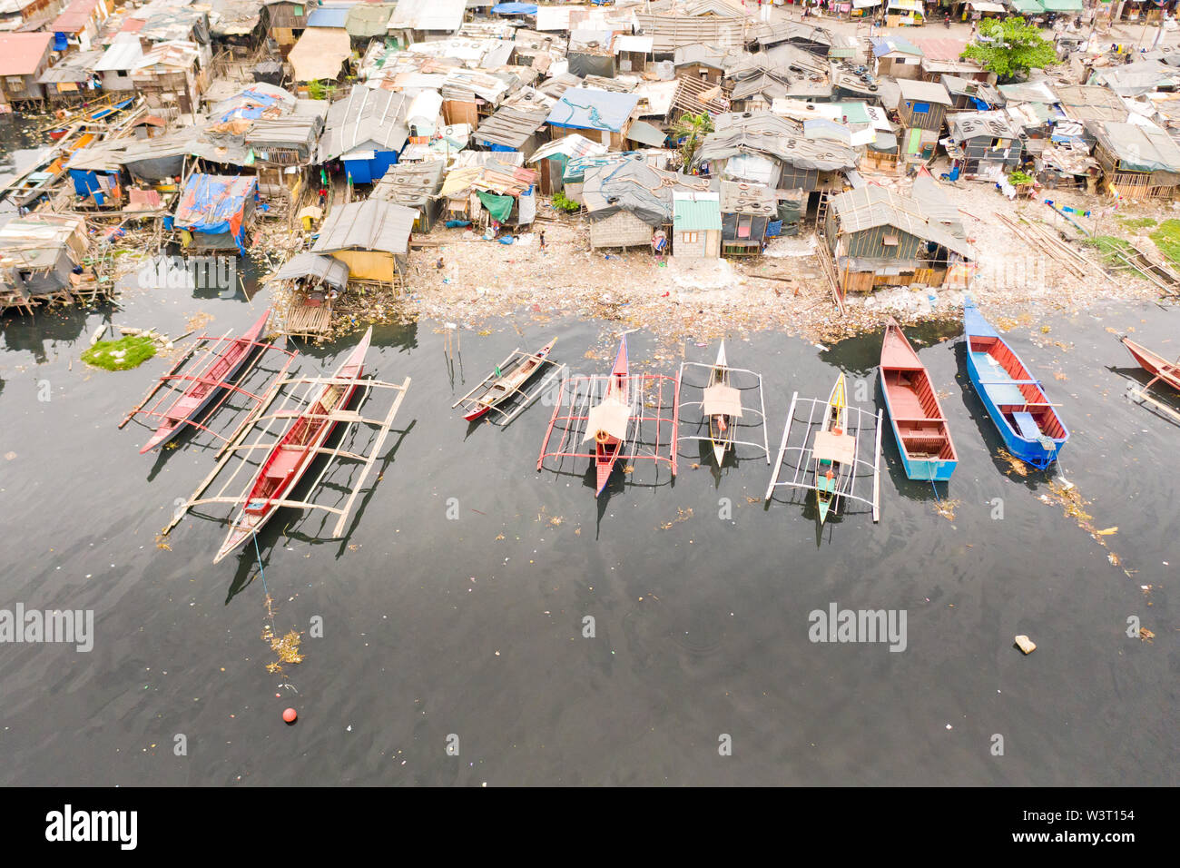 Houses and boats of the poor inhabitants of Manila. Dwelling poor in ...
