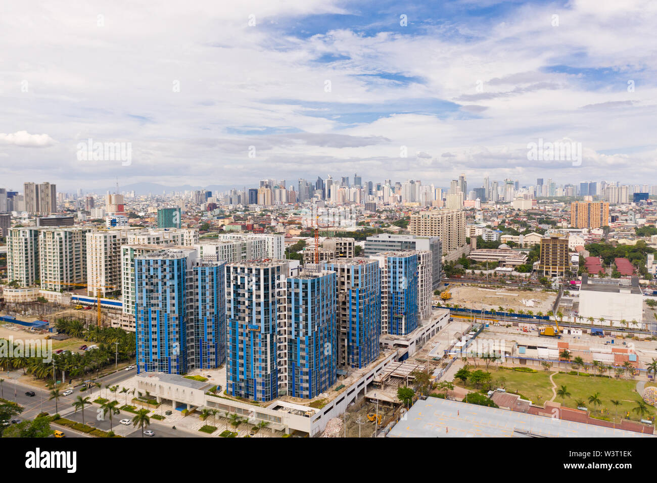 Construction of high modern houses in Manila. The city of Manila, the ...