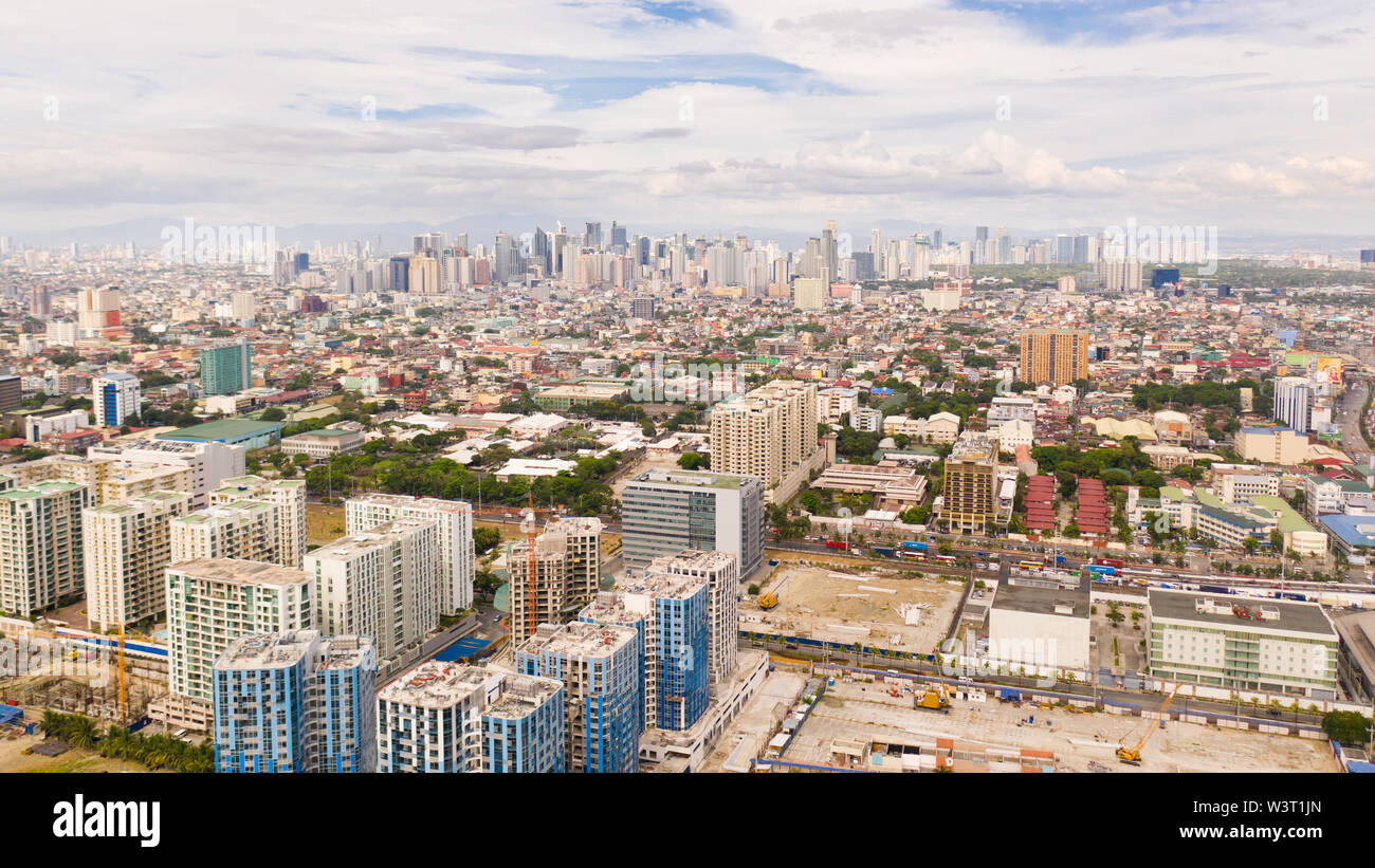 Construction of high modern houses in Manila. The city of Manila, the ...