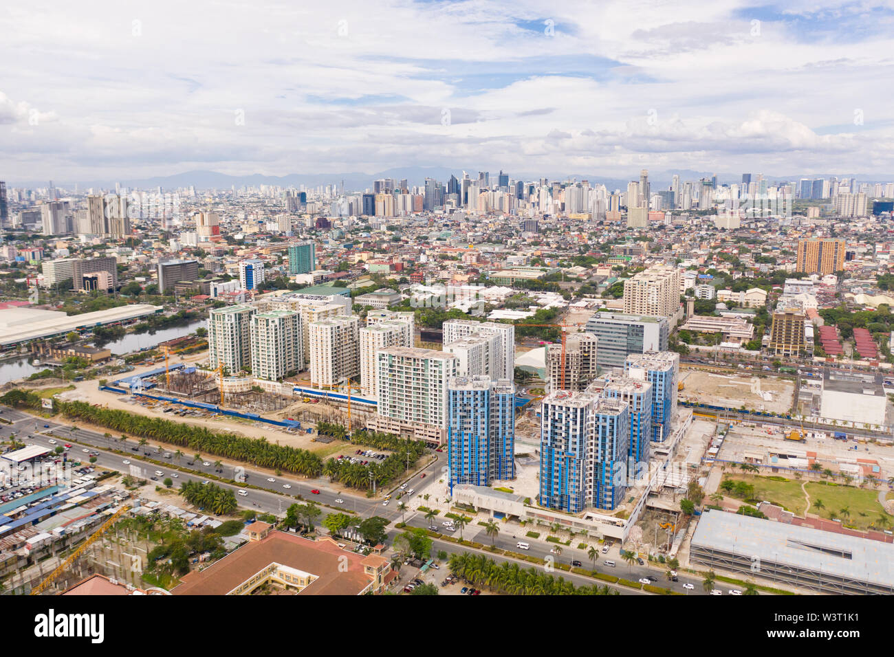 Construction of high modern houses in Manila. The city of Manila, the ...