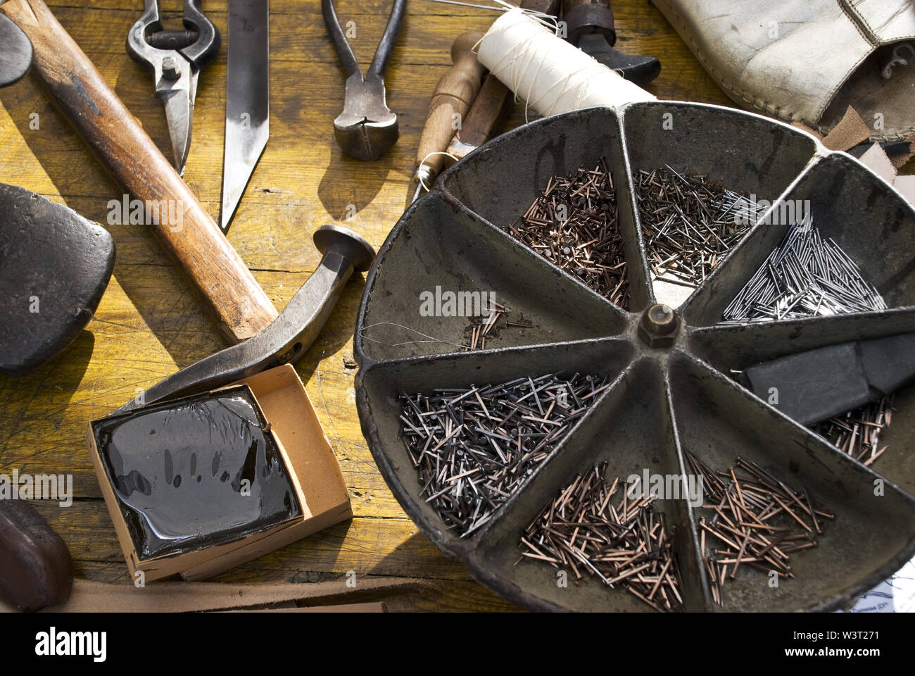 small ancient workshop with tools of the old cobbler's craft Stock ...