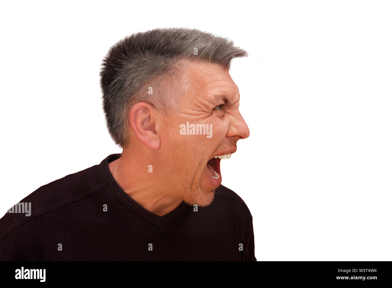 Guy does not look into camera and shouts. Isolated profile portrait on ...