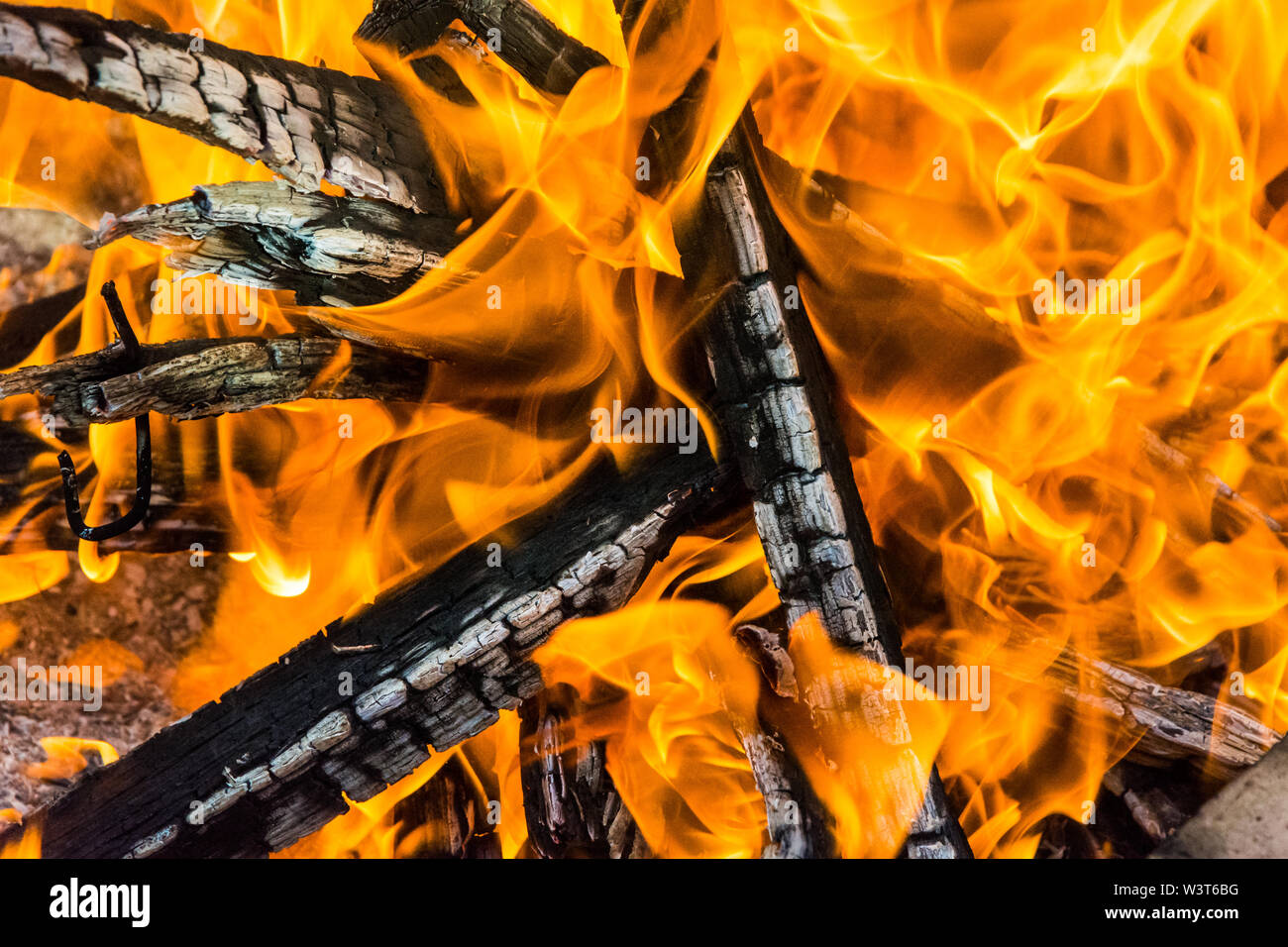 fireplace with wood and fire Stock Photo - Alamy