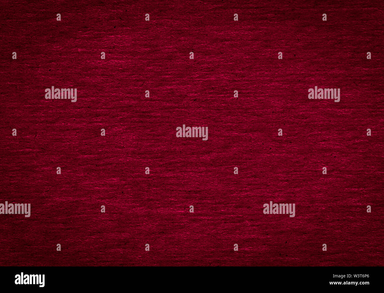Abstract texture of a rough dark burgundy paper background and copy ...