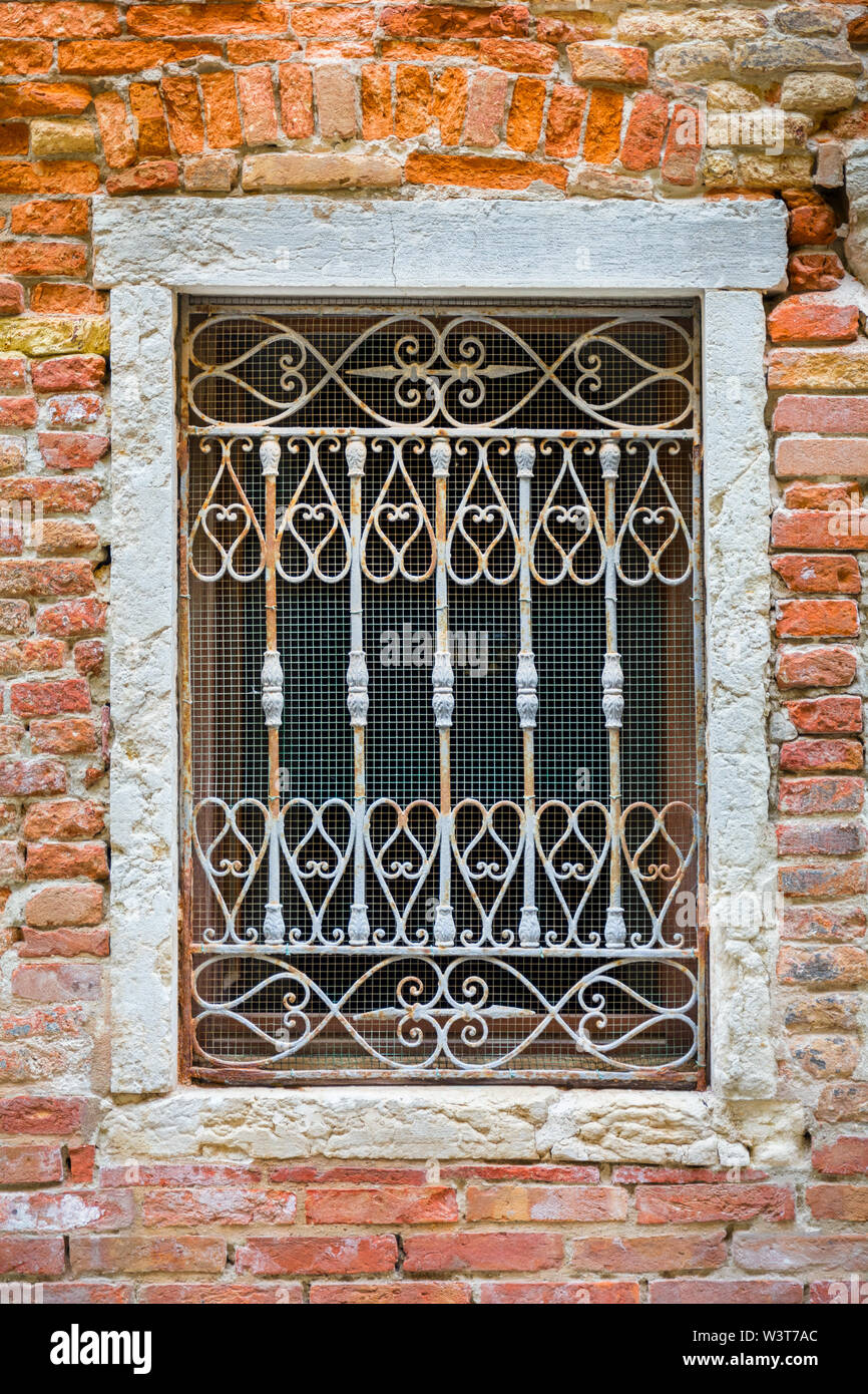 VENICE, ITALY - MAY 14, 2019: Traditional ancient gothic style window ...