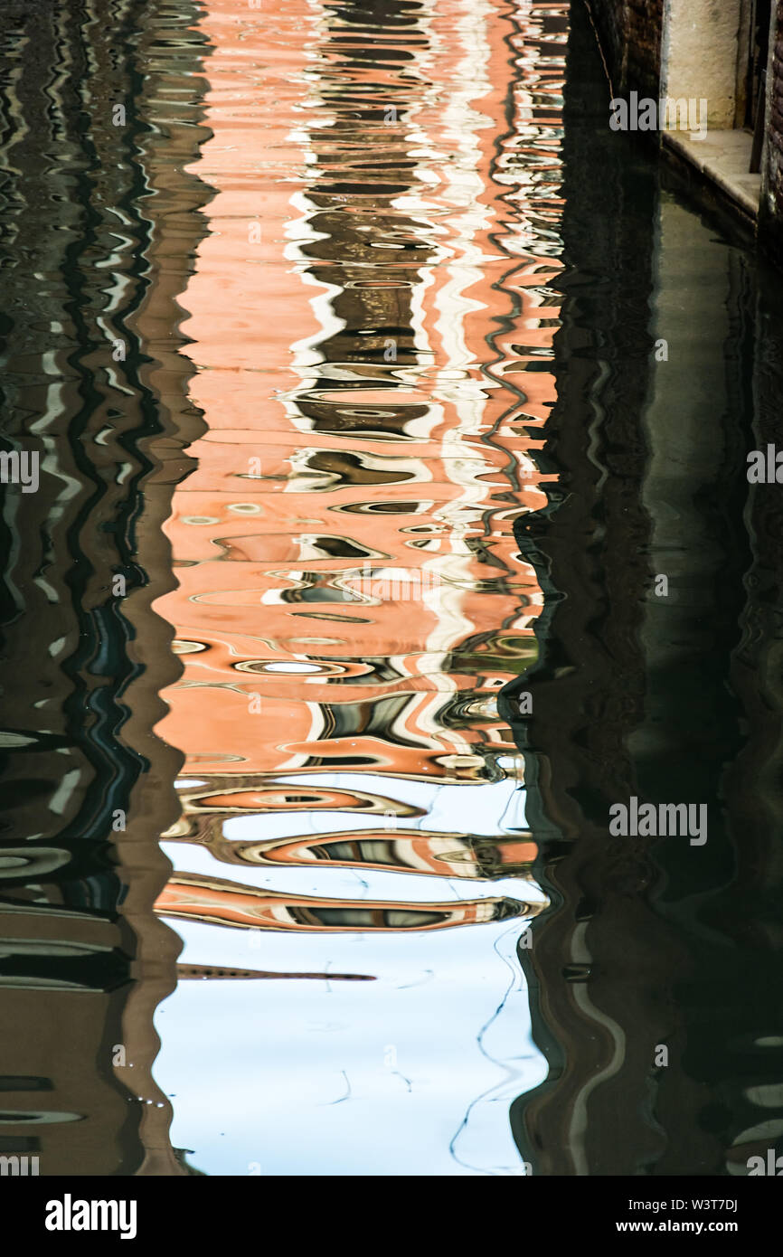 water texture background close up. Bright colorful water reflection ...