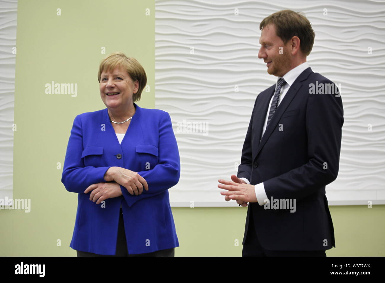 Michael Kretschmer, Bundeskanzlerin Angela Merkel und Ronald Schmidt ...