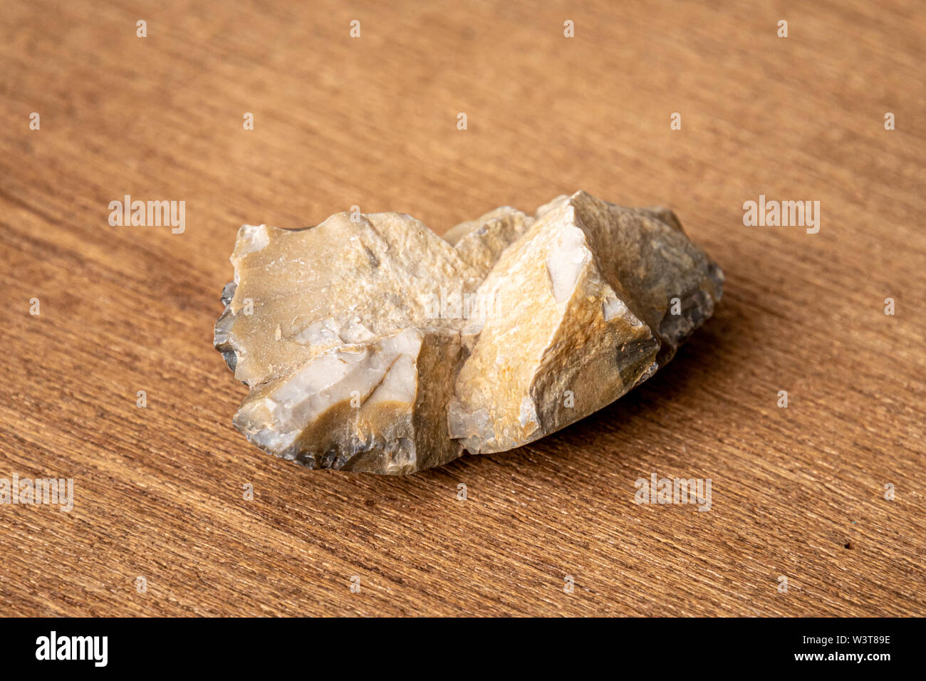 Piece of big flint broken apart and forming sharp edges for stone age ...