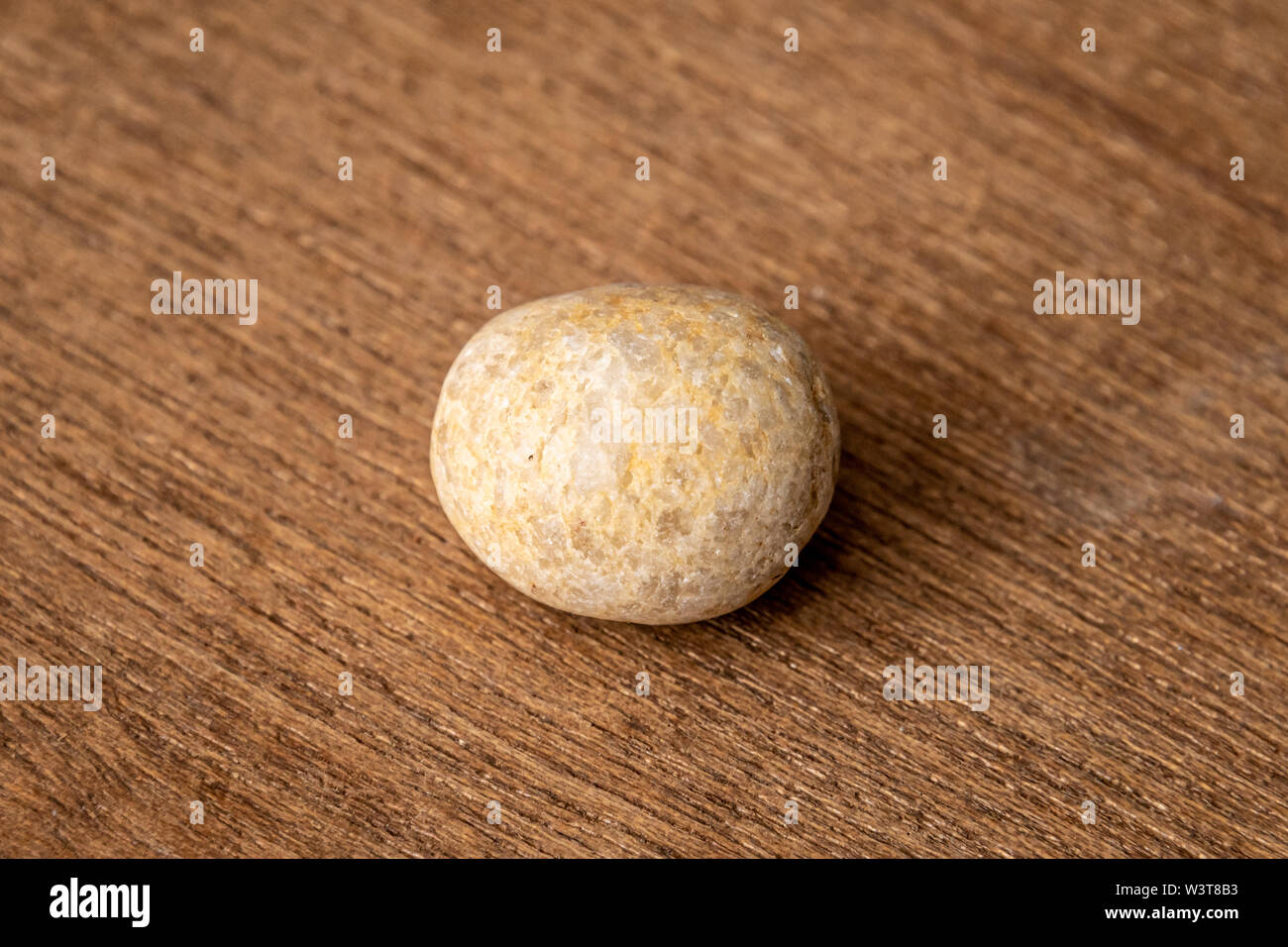 Round small gravel of sandstone washed round by the waves of the sea ...