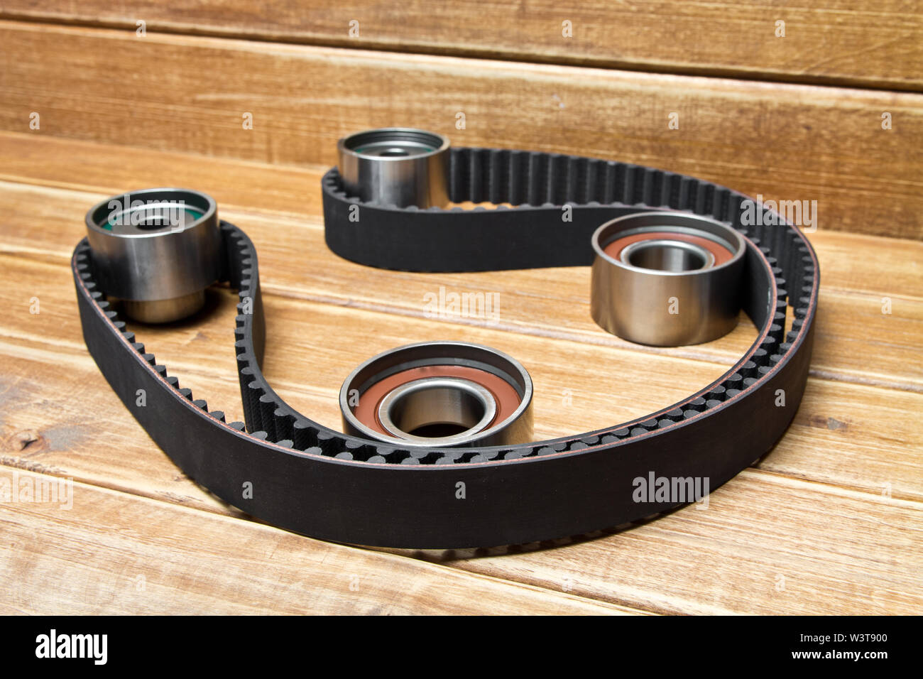 Timing belt with rollers on background .Kit of timing belt for car ...