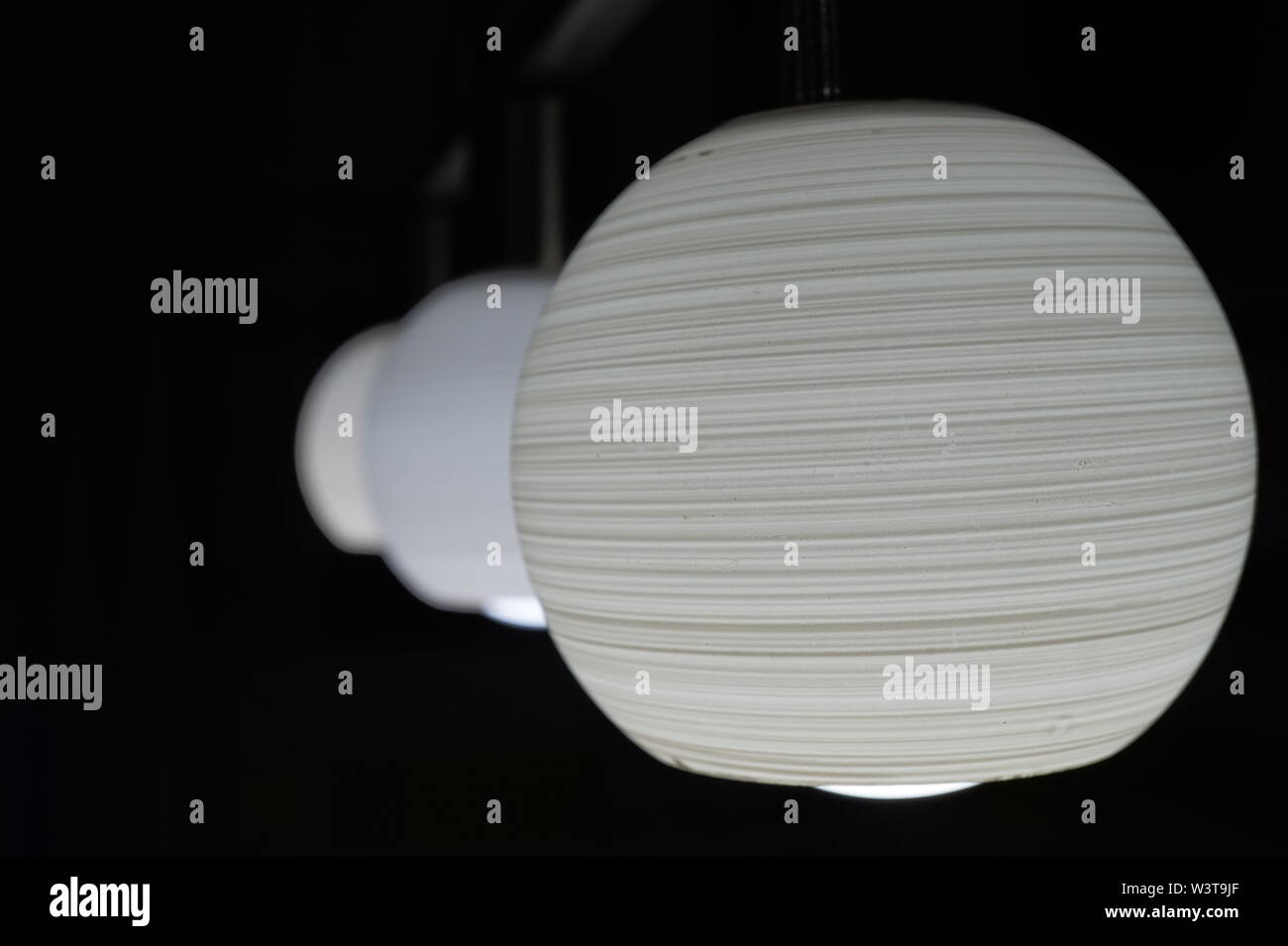 Light bulb decor with dark background Stock Photo - Alamy