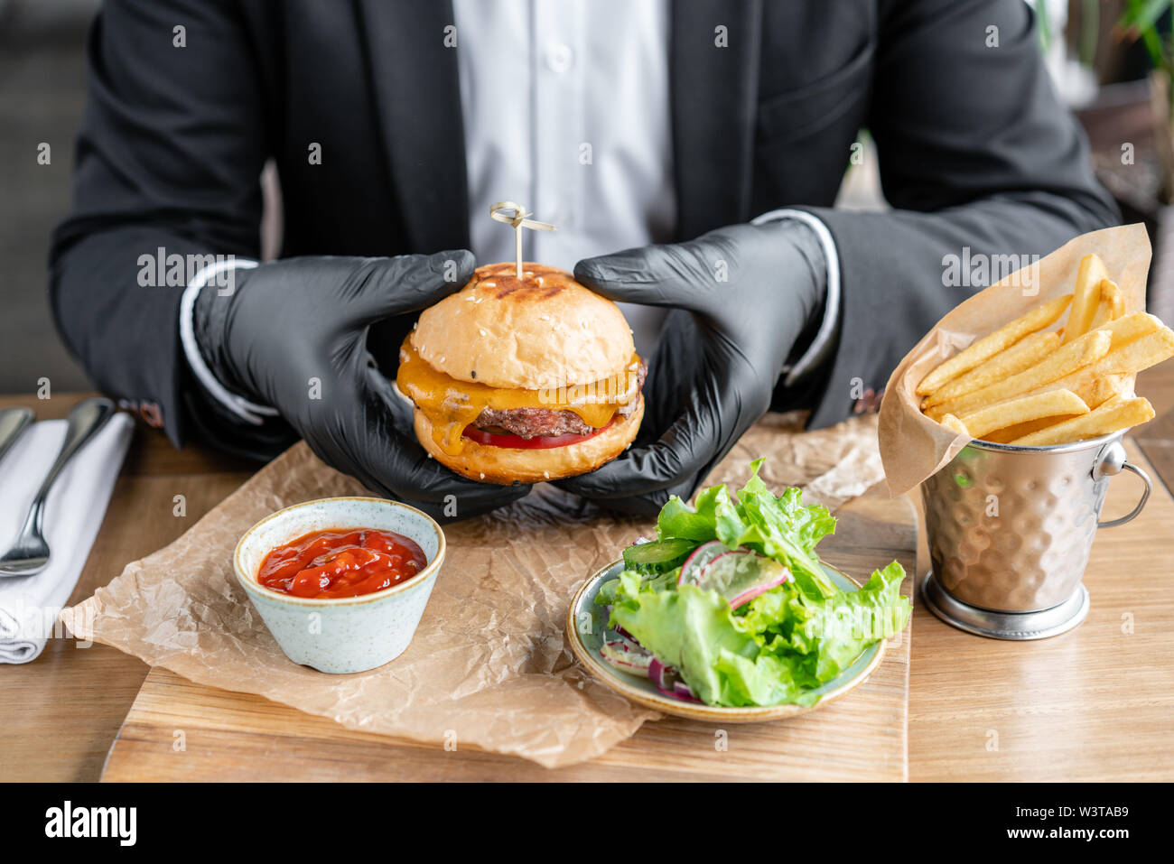 Fat man eating suit hi-res stock photography and images - Alamy