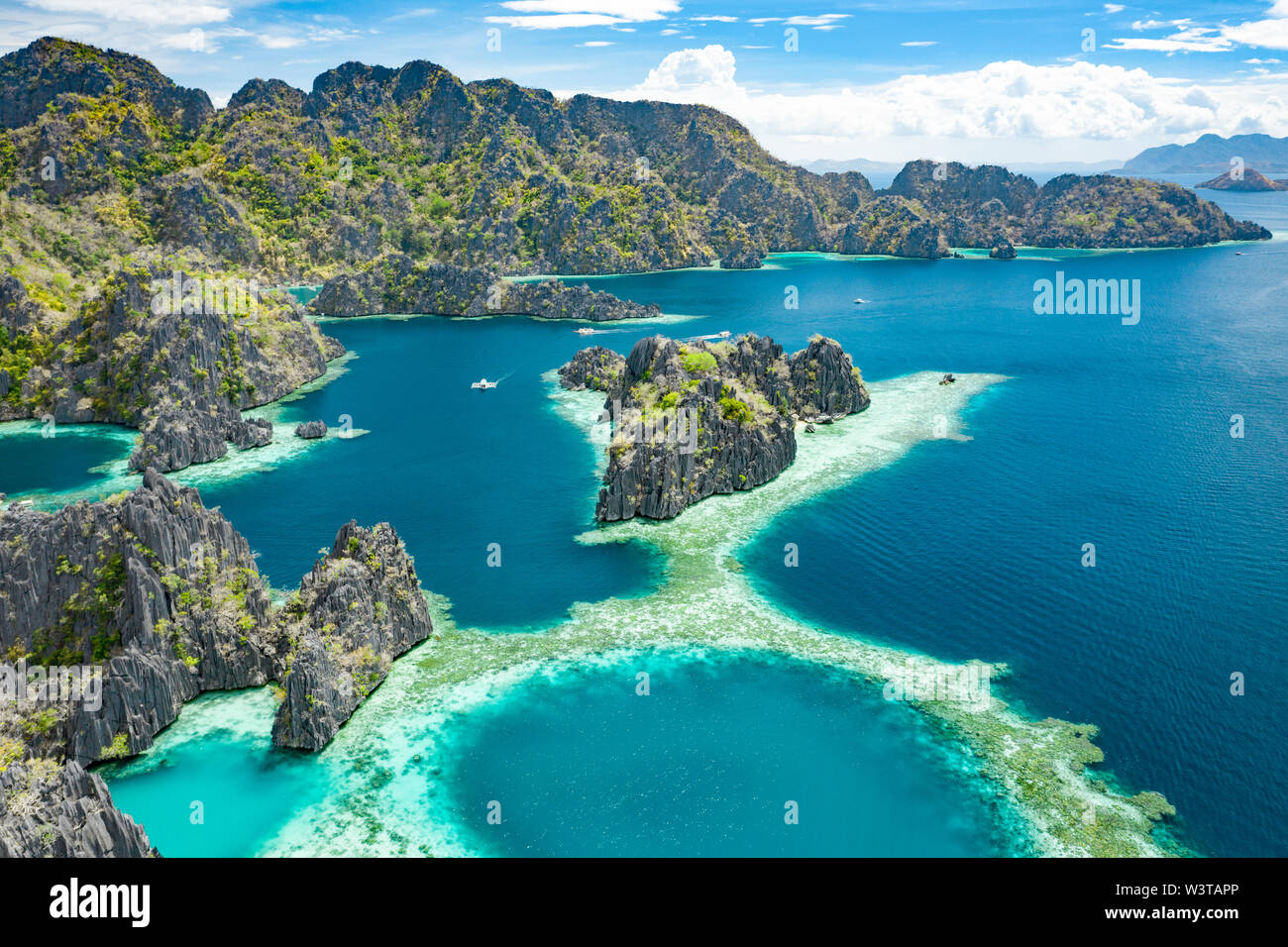 Aerial view of beautiful lagoons and limestone cliffs of Coron, Palawan ...