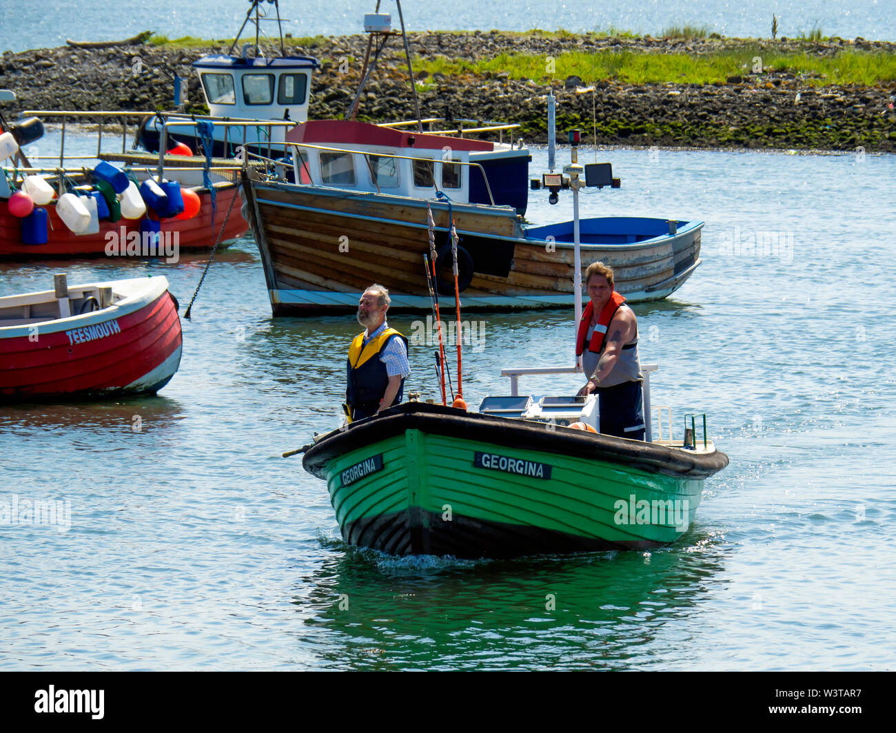 Two anglers at the sea hi-res stock photography and images - Alamy