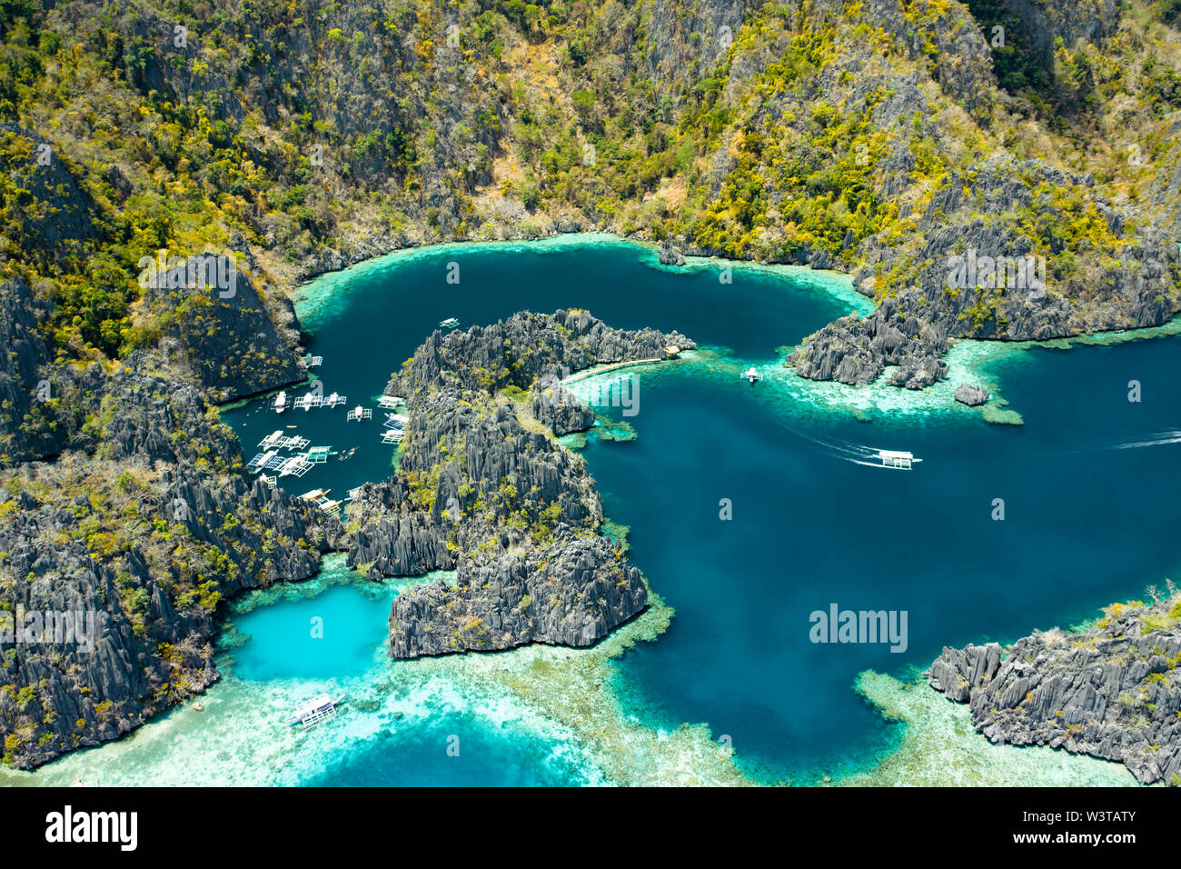 Aerial view of beautiful lagoons and limestone cliffs of Coron, Palawan ...